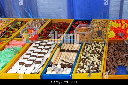 Big assortment of sweets in individual boxes Stock Photo - Alamy