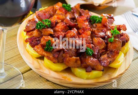 Morro de cerdo a la gallega - spanish dish. Roast nose and cheek pigs ...
