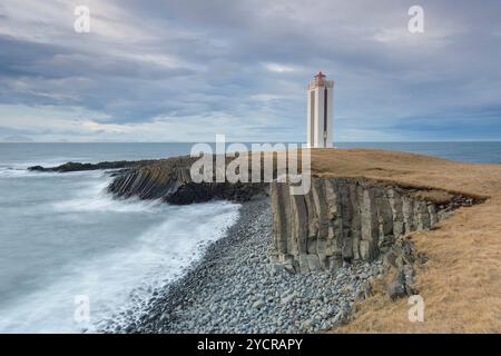 Kalfshamarsvik lighthouse surrounded by basalt rocks, Skagi Peninsula ...
