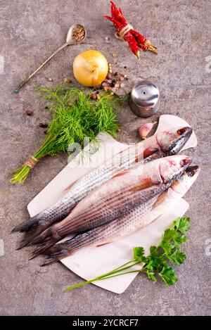 Raw gray Mullet Fish (Kefal) reading for cooking Stock Photo - Alamy