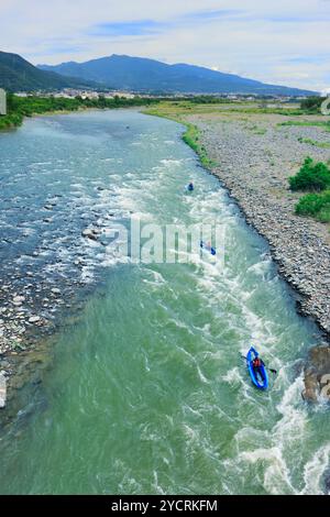 Canoe, Chikuma River and Mount Eboshidake Stock Photo - Alamy
