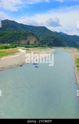 Canoeing and the Chikuma River and Half Passing Rock Nose Stock Photo ...