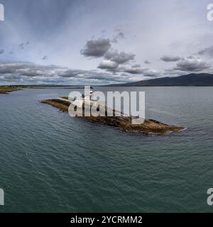 View of the historic Fenit Lighthouse on Little Samphire Island in ...