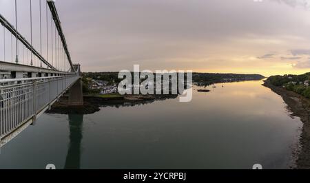 A view of the old Menai Bridge and village with the Menai Strait ...