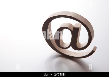 Wood carving atmark Stock Photo - Alamy