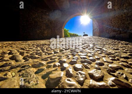Kastav old town gate at sunset view Stock Photo - Alamy