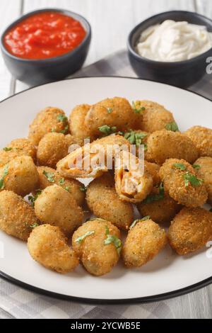 Delicious fresh breaded mussels served with mayonnaise and ketchup ...