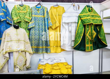 Different solemn slavic orthodox priest's vestments Stock Photo - Alamy