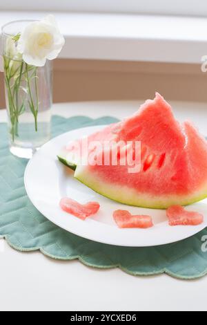 Sliced watermelon on white plate Stock Photo - Alamy