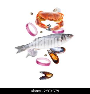Different sea food in air on light blue background Stock Photo - Alamy