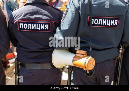 Russian policeman with megaphone speaker Stock Photo - Alamy