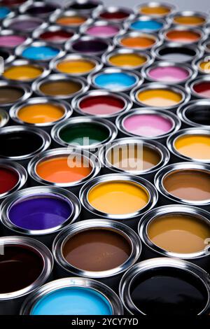 Full Buckets of rainbow colored oil paint Stock Photo - Alamy