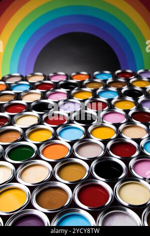 Rainbow, tin metal cans with color paint Stock Photo - Alamy