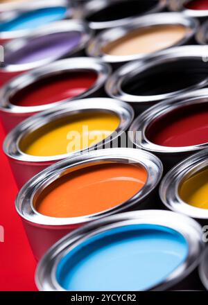 Collection of colored paints cans Stock Photo - Alamy