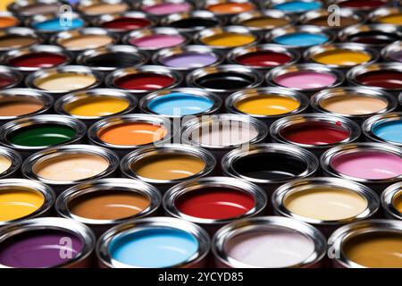 Buckets full of rainbow colored oil paint Stock Photo - Alamy