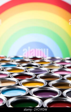 Rainbow colors, Group of tin metal cans Stock Photo - Alamy