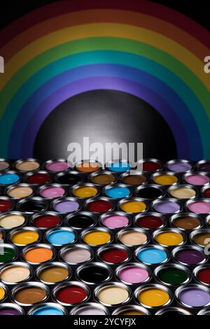 Rainbow colors, Open cans of paint Stock Photo - Alamy