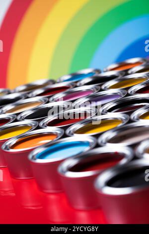 Rainbow colors, Group of tin metal cans Stock Photo - Alamy