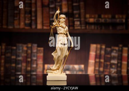 Antique statue of justice, law, books background Stock Photo - Alamy