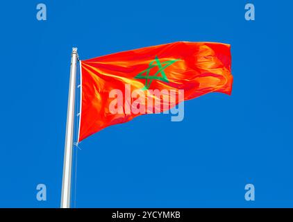 Morocco flag waving in the wind, white background, realistic 3D ...