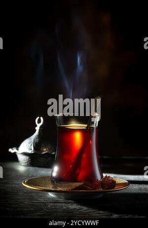 Glass of Turkish Black Tea and Bowl of Sugar Cubes isolated on white ...