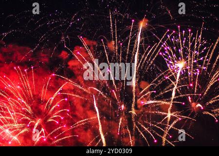 Fireworks on the black sky. Festive show. Large-scale celebration. The ...