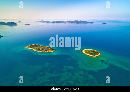 Two lonely stone islands in Zadar archipelago aerial view, Dalmatia ...