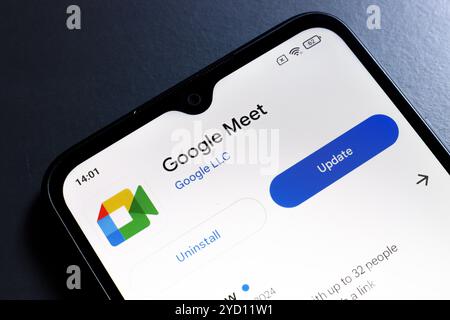 In this photo illustration, the Google Meet logo is displayed on a ...