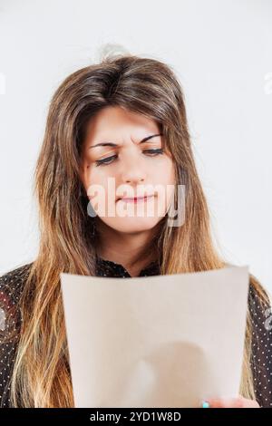 Confused frowning young brunette white woman in casual clothes standing ...
