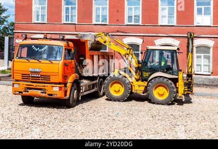 Front loader working on the construction of new road Stock Photo - Alamy