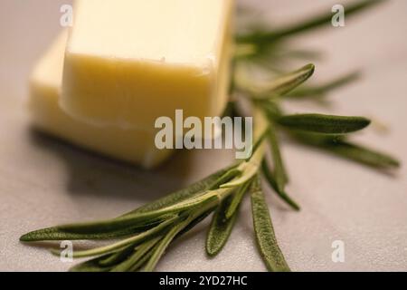 A close-up shot of cubed butter on a small plate, arranged neatly ...