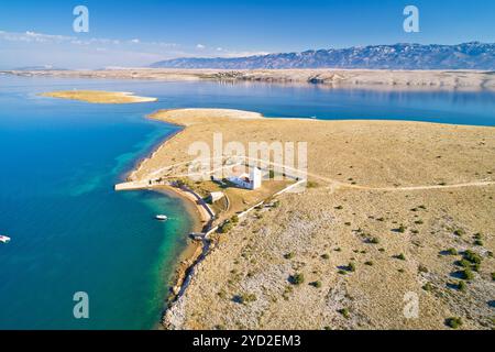 Stone desert island of Zecevo church and pilgrimage aerial view, Zadar ...