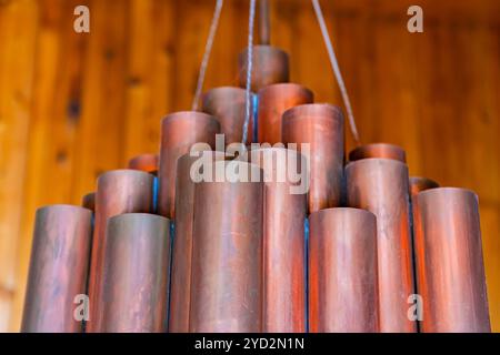 Copper cylindrical tubes chandelier Stock Photo - Alamy