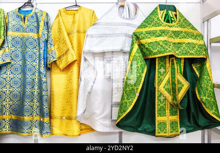 Different solemn colorful orthodox priest's robes, clergyman's ...