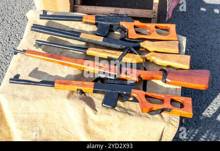 Different handmade wooden toy rifles for children Stock Photo - Alamy