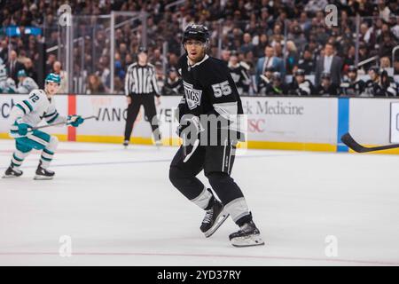 Los Angeles Kings' Quinton Byfield (55) moves the puck against the Carolina Hurricanes during ...