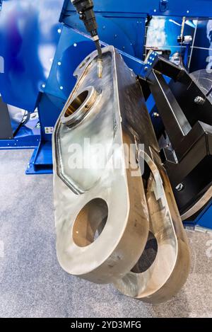 Robot welds steel. Welding head. Welding robot. CNC welding ...