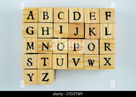 letters of the latin alphabet on wooden cubes on a neutral background ...