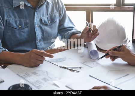 Architects interior designer hands working with Blue prints and ...