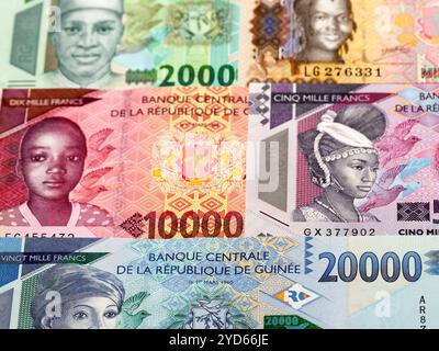 Guinean money - Franc a business background Stock Photo - Alamy