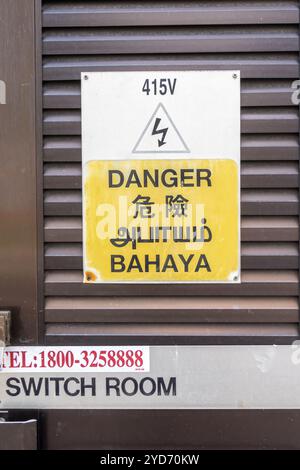 Danger Sign in Four Languages, English, Chinese, Malaysian, Tamil ...