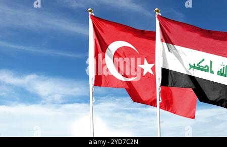 Iraqi and Turkish flags flutter under cloudy sky. fly in the sky Stock ...