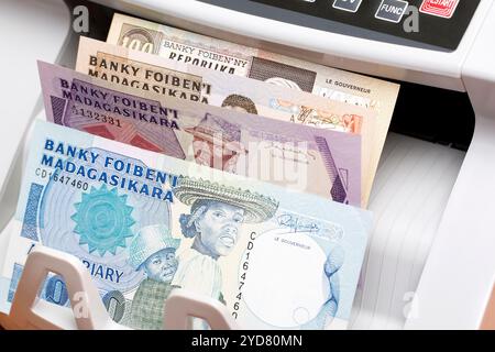 Old Malagasy money - ariary in the counting machine Stock Photo - Alamy
