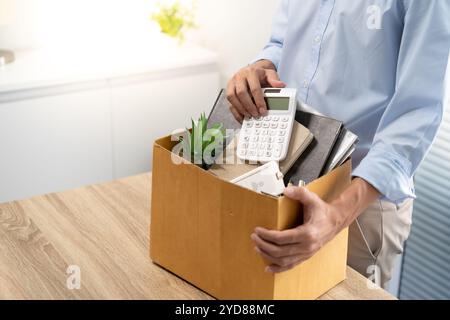 Business man sending resignation letter to boss and Holding Stuff ...