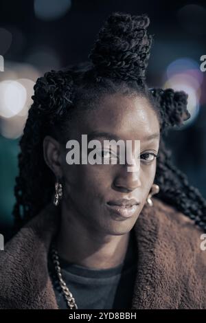 Black female model in Soho at night Stock Photo - Alamy