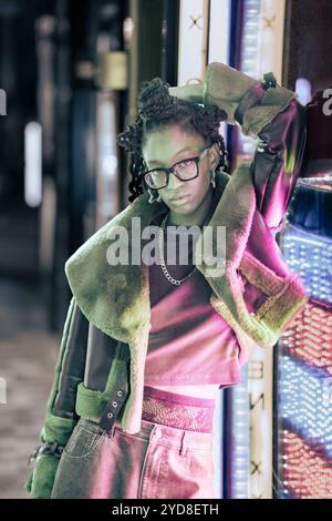 Black female model in Soho at night Stock Photo - Alamy