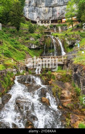 St. Beatus Waterfall at St. Beatus Caves entrance in Beatenberg ...