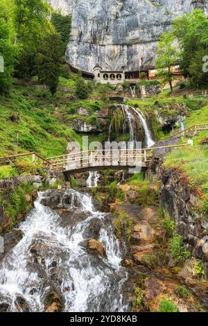 St. Beatus Waterfall at St. Beatus Caves entrance in Beatenberg ...