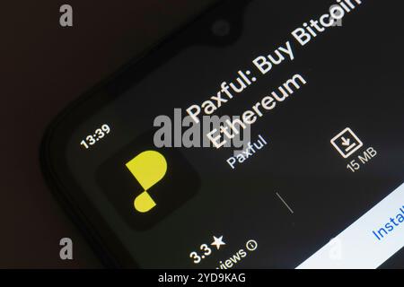 In this photo illustration, the Paxful logo is displayed on a ...