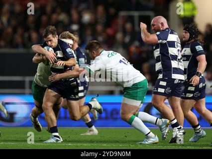 Bristol Bears' AJ MacGinty is tackled by Bath's Kepu Tuipulotu during ...